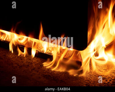 set of drawers on fire engulfed in flames Stock Photo - Alamy