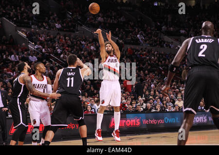 Portland Trail Blazers' Robin Lopez, left, gets a rebound against Los ...