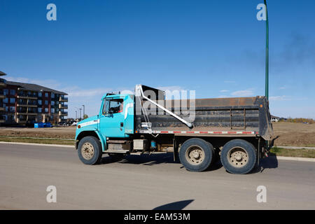construction dump truck at new condominium building in suburban ...
