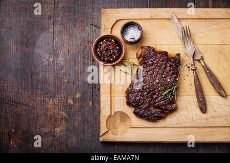 Grilled juicy beef steak with pepper served rosemary Stock Photo - Alamy