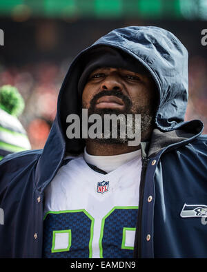 Seattle Seahawks defensive tackle Tony McDaniel (99) flexes his muscles ...