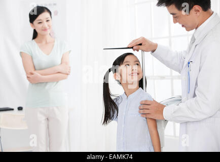 Children's measuring height Stock Photo - Alamy