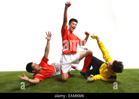 Football players celebrate success Stock Photo - Alamy
