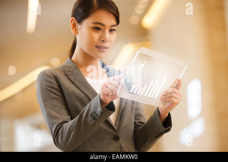 Young business lady use tablet computers Stock Photo - Alamy