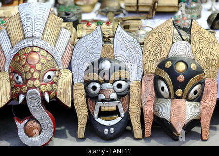 Hand carved wood Nepali masks Stock Photo - Alamy