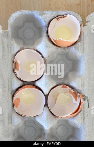 Heap of brown empty egg shells close up isolated on white background ...