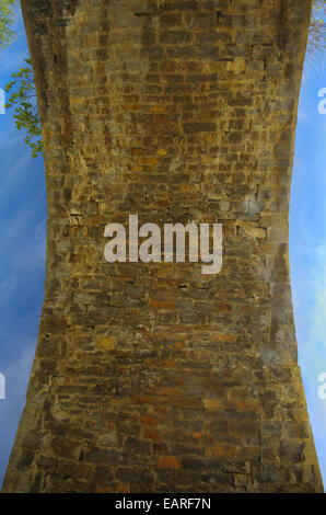 Stone bridge wall of hewn stones Stock Photo - Alamy