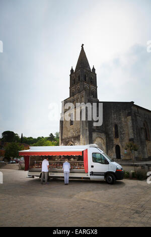 Mobile Butcher van visiting french village square Stock Photo - Alamy