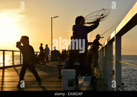 People fishing on Semaphore jetty in Adelaide Stock Photo - Alamy