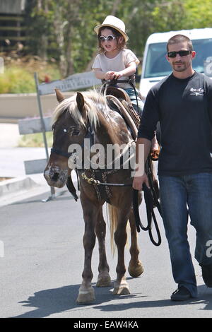 Skyler Berman rides a pony at the Farmers Market in Beverly Hills ...