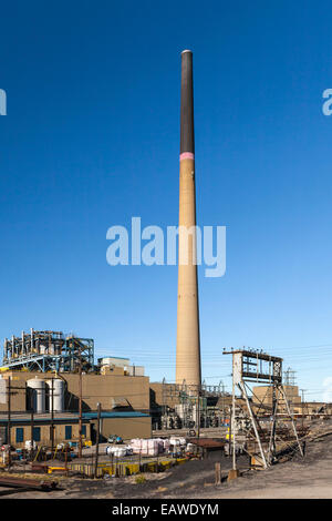 A tall smoke stack chimney at the Hudson's Bay Mining and Smelting Co ...