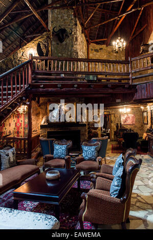 Sitting area in balcony with comfortable furniture around beautiful ...