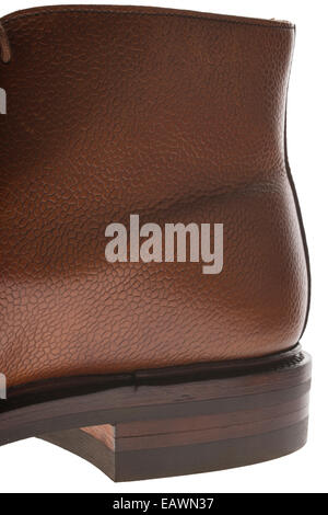 Side of rustic, textured shoe leather. Polished surface of English real ...