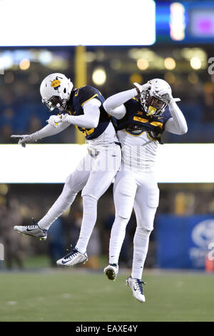 West Virginia linebacker Xavier Preston (53) and safety KJ Dillion (9 ...
