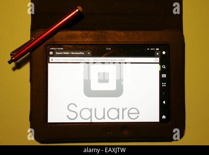 Square payments app logo shown on tablet screen with stylus, London ...