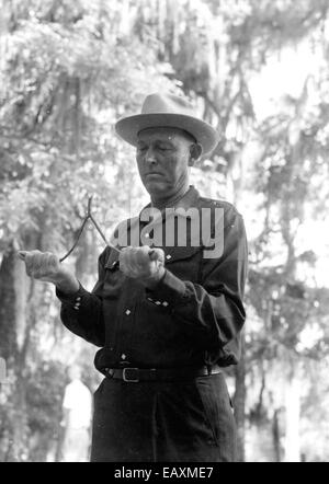Lonnie Morgan, a traditional water witcher, demonstrates his water ...