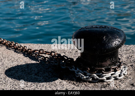 Mooring bollard at Spanish harbour Stock Photo - Alamy