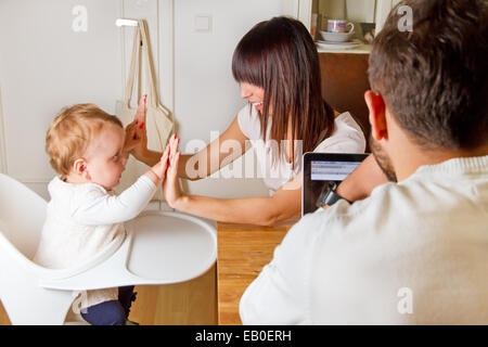 Family together at home - typical gender role Stock Photo: 75614328 - Alamy