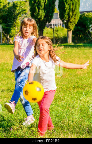 Two happy little girls Stock Photo - Alamy