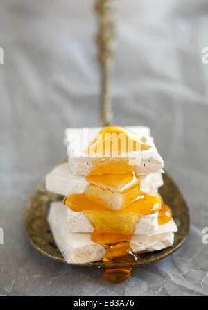 close up view on stack of red christmas balls on wooden boards ...