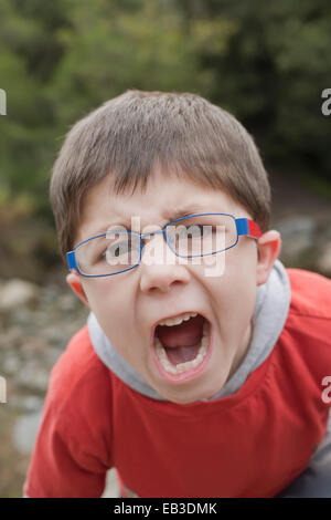 Hispanic boy making a face Stock Photo - Alamy