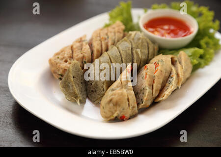''Mooyor'' or Vietnamese sausage pork with sauce on a plate Stock Photo ...