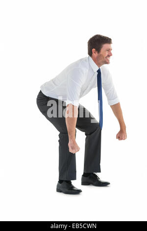 Strong businessman lifting up something on white background Stock Photo ...