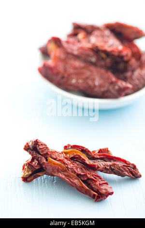 Red tomato on the table. Many tomatoes on wooden table. Locally grown ...