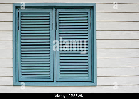 Beautiful cyan wooden window on a white wood background Stock Photo - Alamy