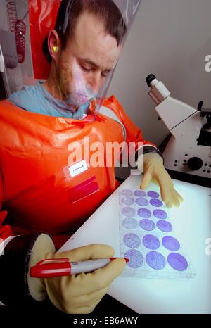 Biosafety level 4 hazmat suit Stock Photo - Alamy