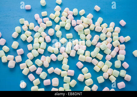 Small round multicolor marshmallows on a white backgrouns Stock Photo ...