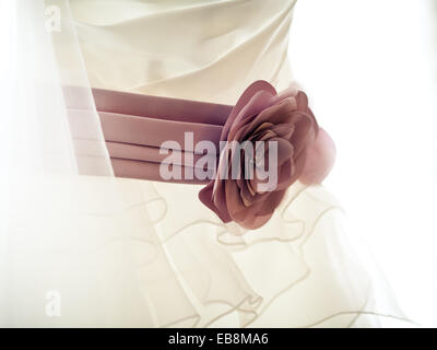 Wedding Band on Pink Flower Stock Photo - Alamy