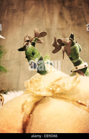 Christmas reindeer horns on color background Stock Photo - Alamy