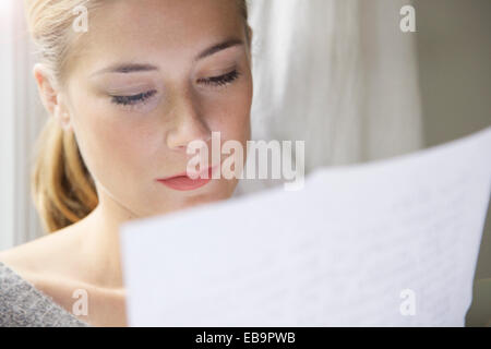 Woman Reading Letter Stock Photo - Alamy