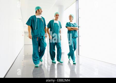 surgeons walking in the operating room hallway Onkologikoa Hospital ...