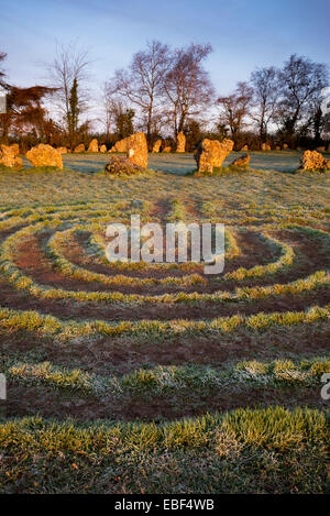 Labyrinth symbol at the Rollright stones covered in snow in winter ...
