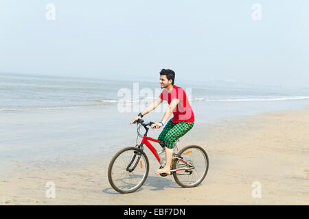 indian man beach Riding Cycle Stock Photo - Alamy