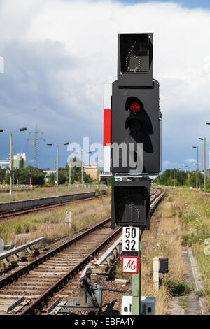 red light at a train traffic light signal system Stock Photo - Alamy
