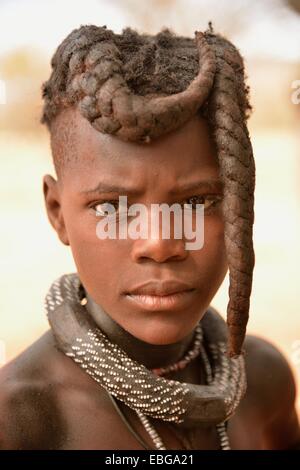 Himba girl with typical hairstyle, Omuramba, Kaokoland, Kunene, Namibia ...