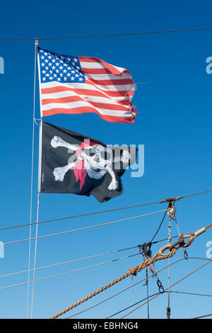 Boat of American pirates with flags Stock Photo - Alamy