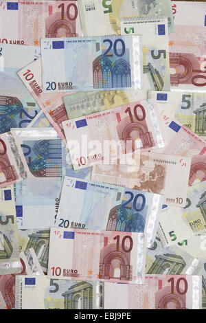 Top view of Euro 20 and 10 banknotes on a meatal heater at home Stock ...