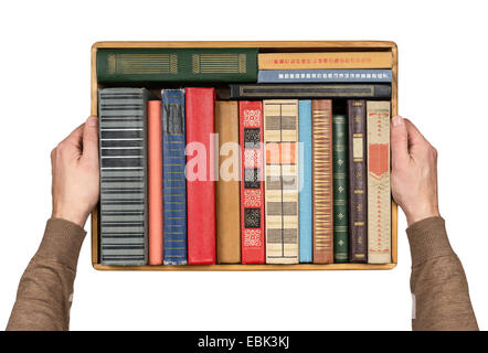 Hands holding open old book with magic seascape on light background ...