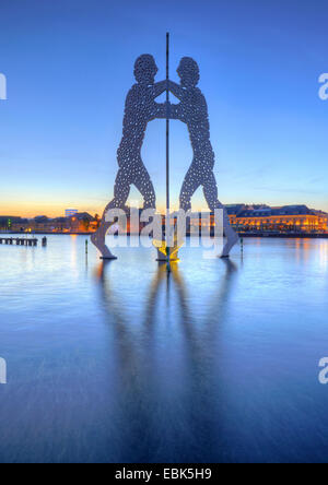 statue of Molecule Man in the river spree with view on berlin Stock ...