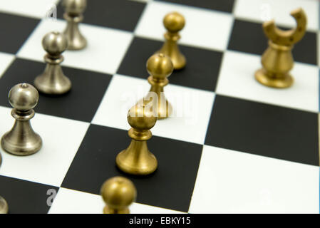 Classic chess game - pieces in play on chessboard Stock Photo - Alamy