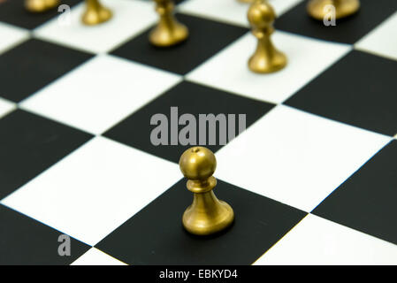 Classic chess game - pawn alone in front on chessboard Stock Photo - Alamy