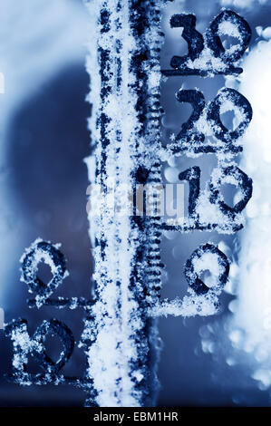 Frosty snow-capped outdoor Thermometer on a extremely cold, frigid ...