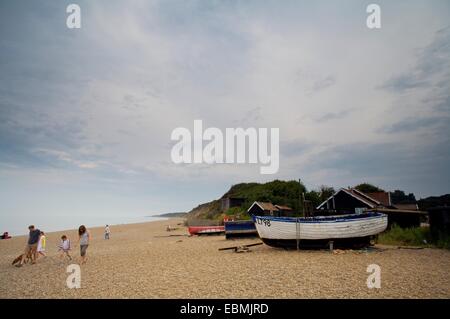 Boat and shingle beach Dunwich Suffolk England UK Stock Photo - Alamy
