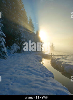 morning sun breaking through the fog. landscape Stock Photo - Alamy