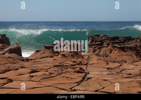 Sea spray over Rocks Stock Photo - Alamy