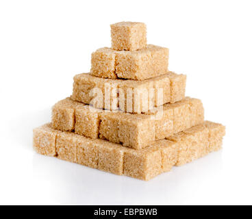 Sweet cane sugar pyramid. Cane sugar cubes Stock Photo - Alamy